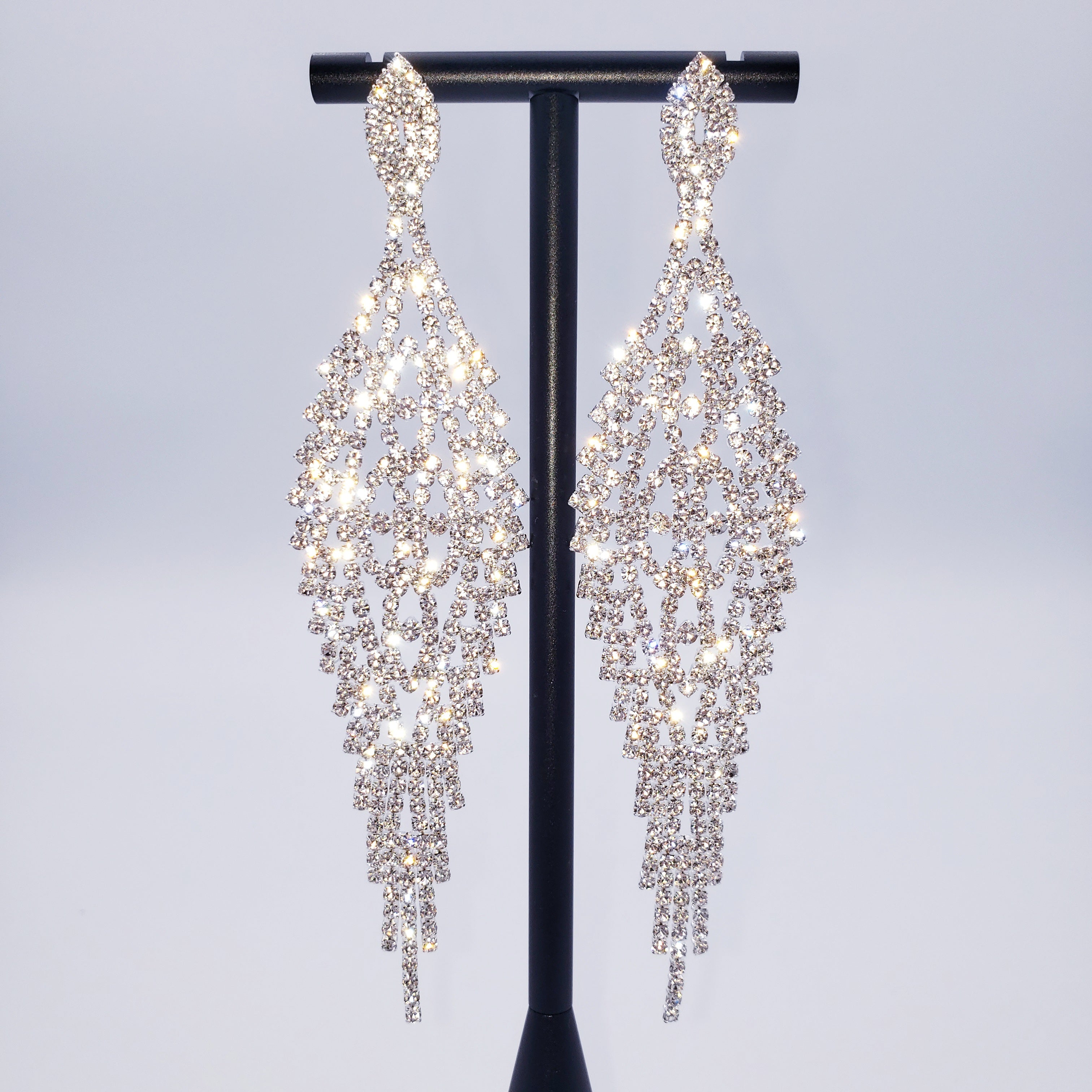 Feather rhinestone Earrings – RAH Competition